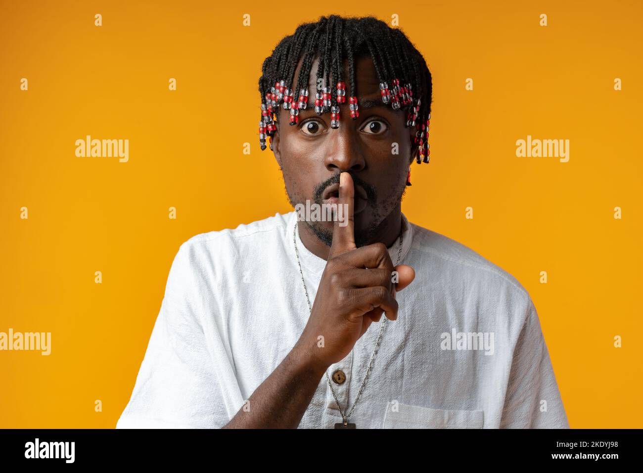 Hand over mouth african hi-res stock photography and images - Alamy