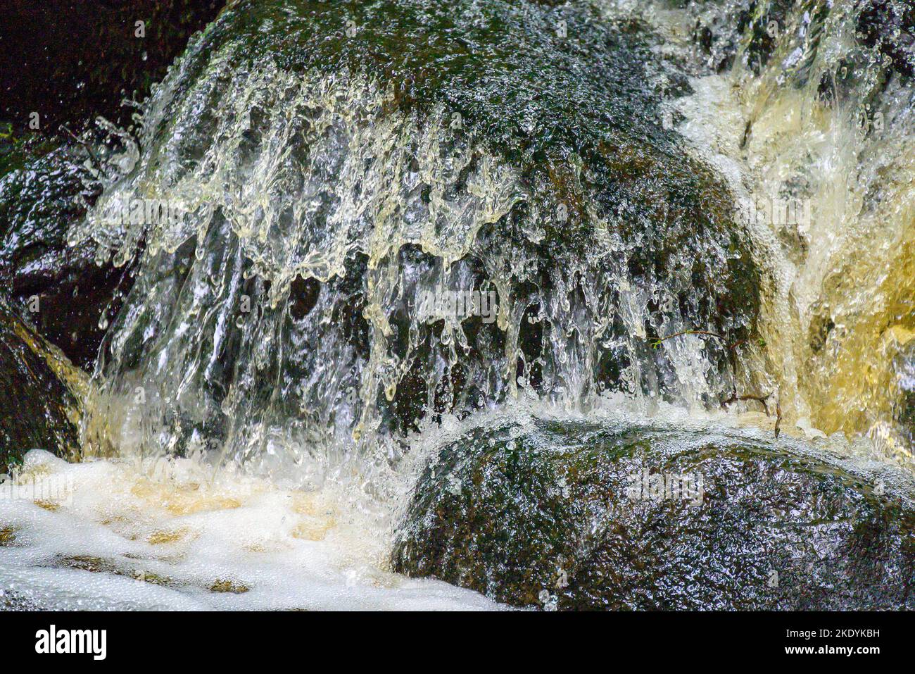 Rapid water stream in waterfall on small river Stock Photo - Alamy
