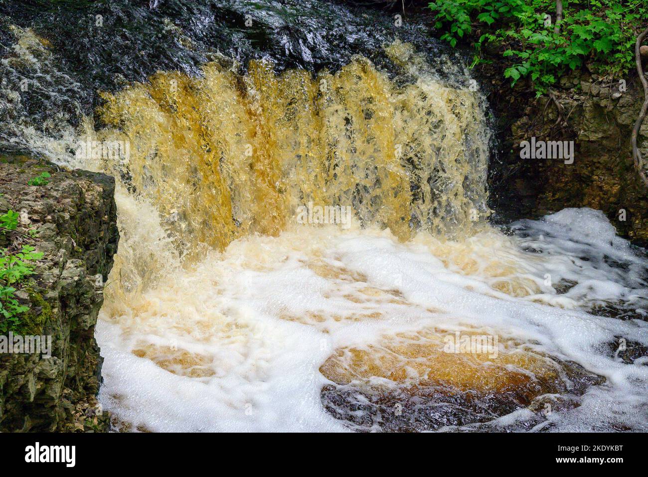 Rapid water stream in waterfall on small river Stock Photo - Alamy