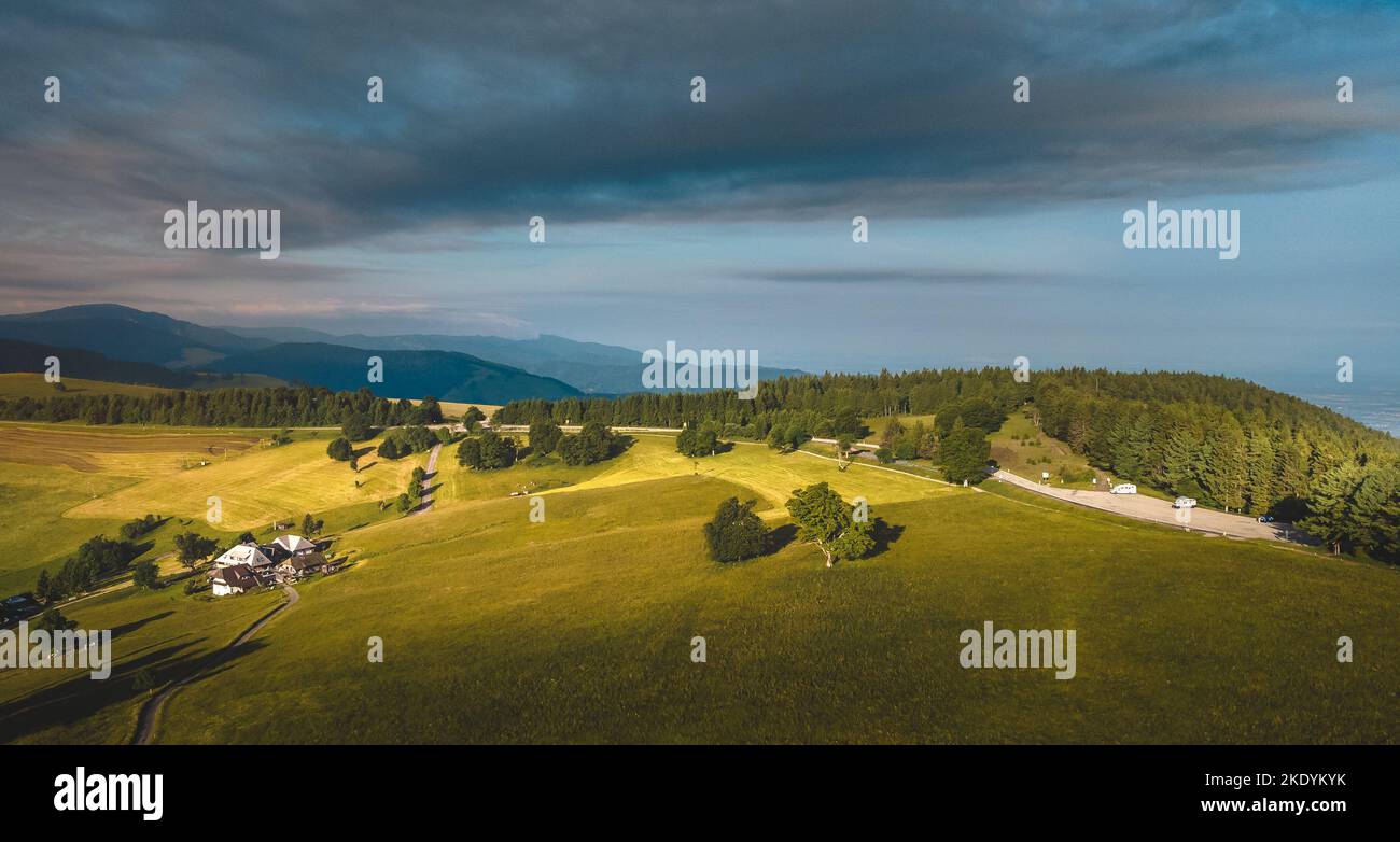 A panoramic view of the Black Forest mountain range under a cloudy sky ...