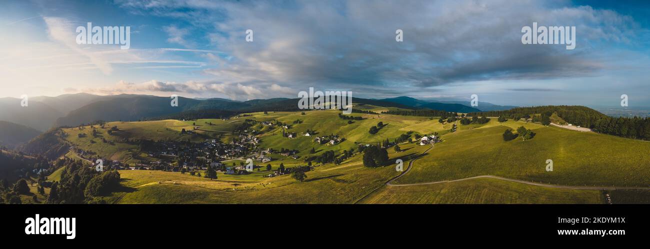 A panoramic view of the Black Forest mountain range under a cloudy sky ...