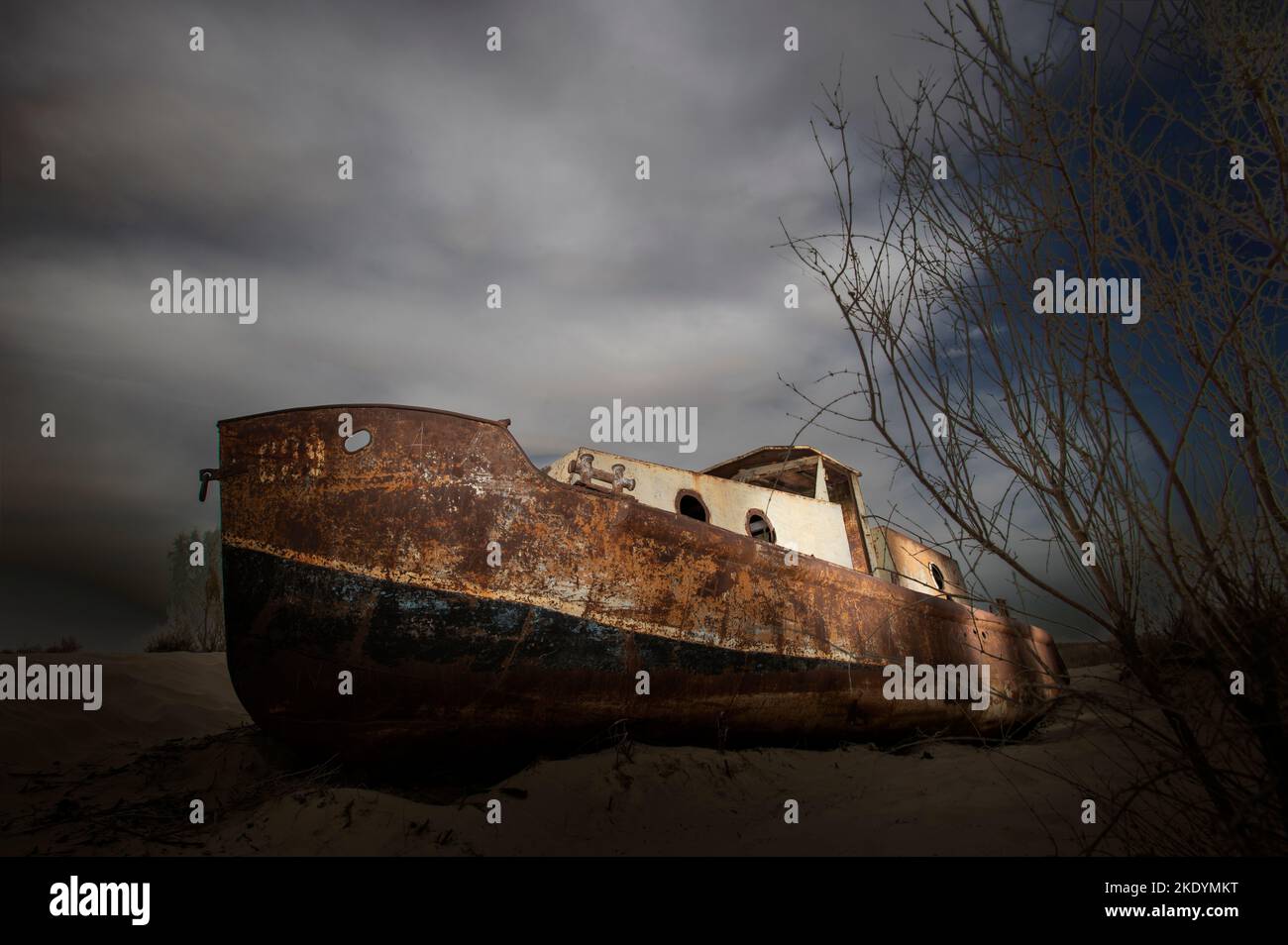 abanedoned fishing boats by the town of muynaq, aral sea, Uzbekistan ...