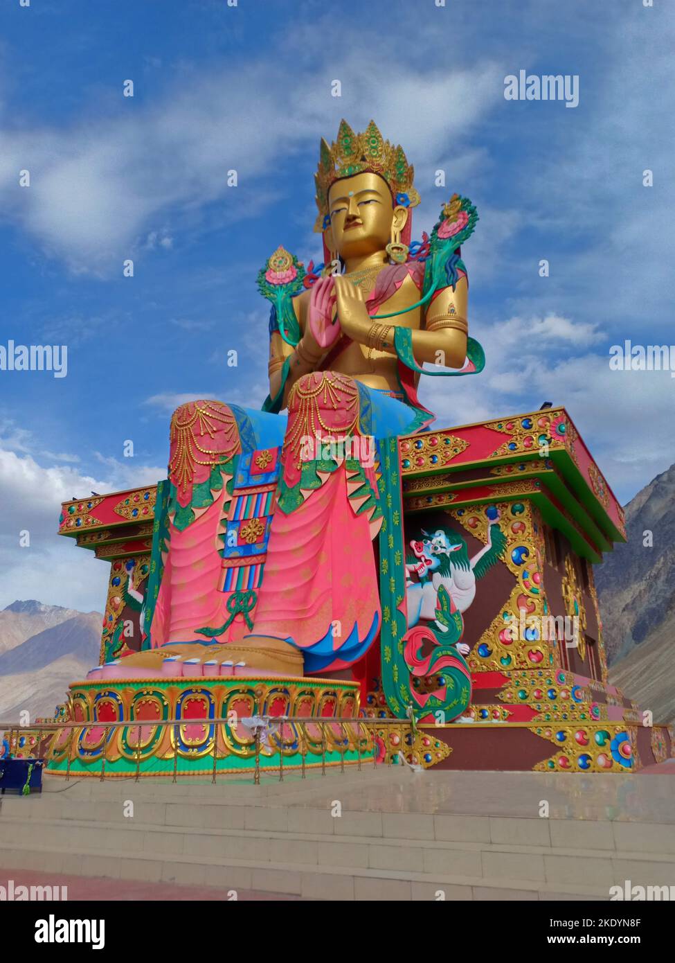 A vertical shot of the Diskit Gompa monastery against the blue sky ...