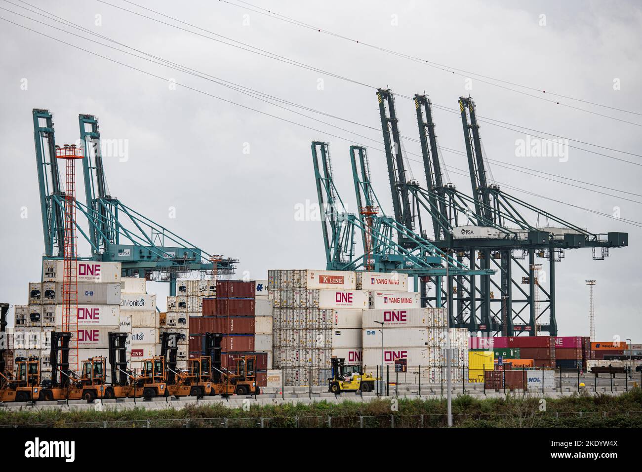 Large boat-cranes with their arms raised, indicating containers are not ...