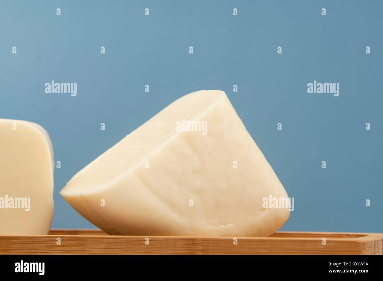 Minas half-cured cheese on a bamboo tray Stock Photo - Alamy