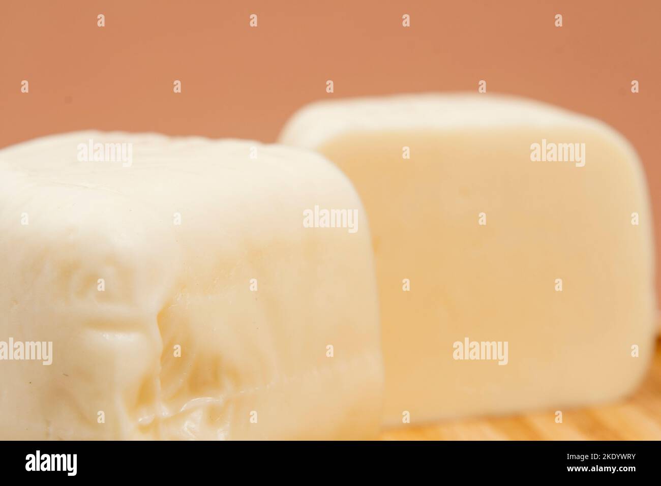 Minas half-cured cheese on a bamboo tray in color background Stock ...