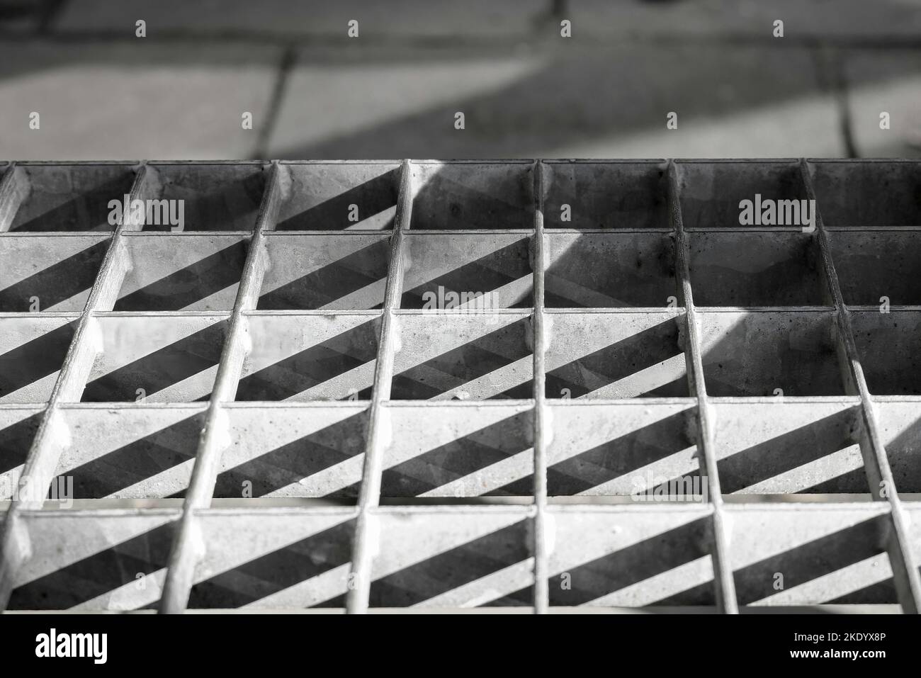 Sunshine casting a shadow pattern on a brick wall Stock Photo - Alamy