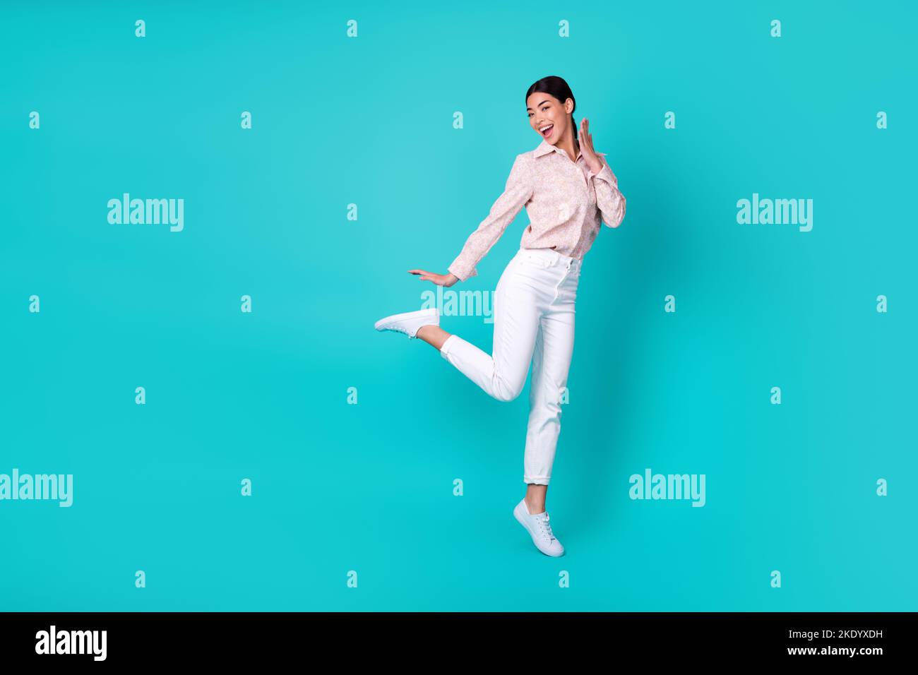 Full length photo of cute young korean lady laugh dance rejoice weekend ...