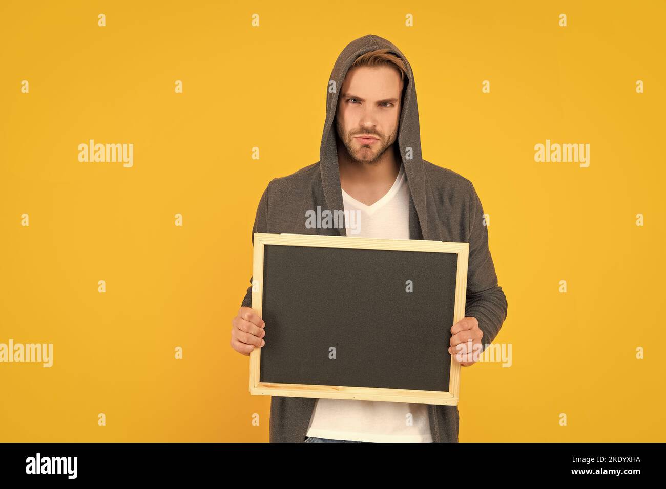 guy make announcement. male behind chalkboard. place for useful ...