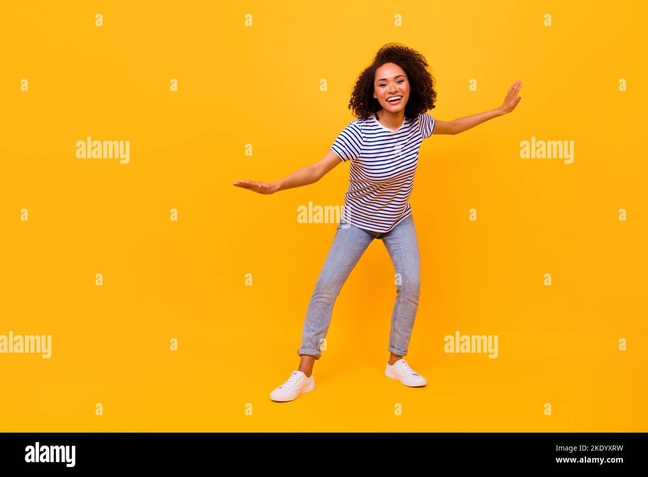 Full body photo of charming cheerful girl hands make moves dancing ...