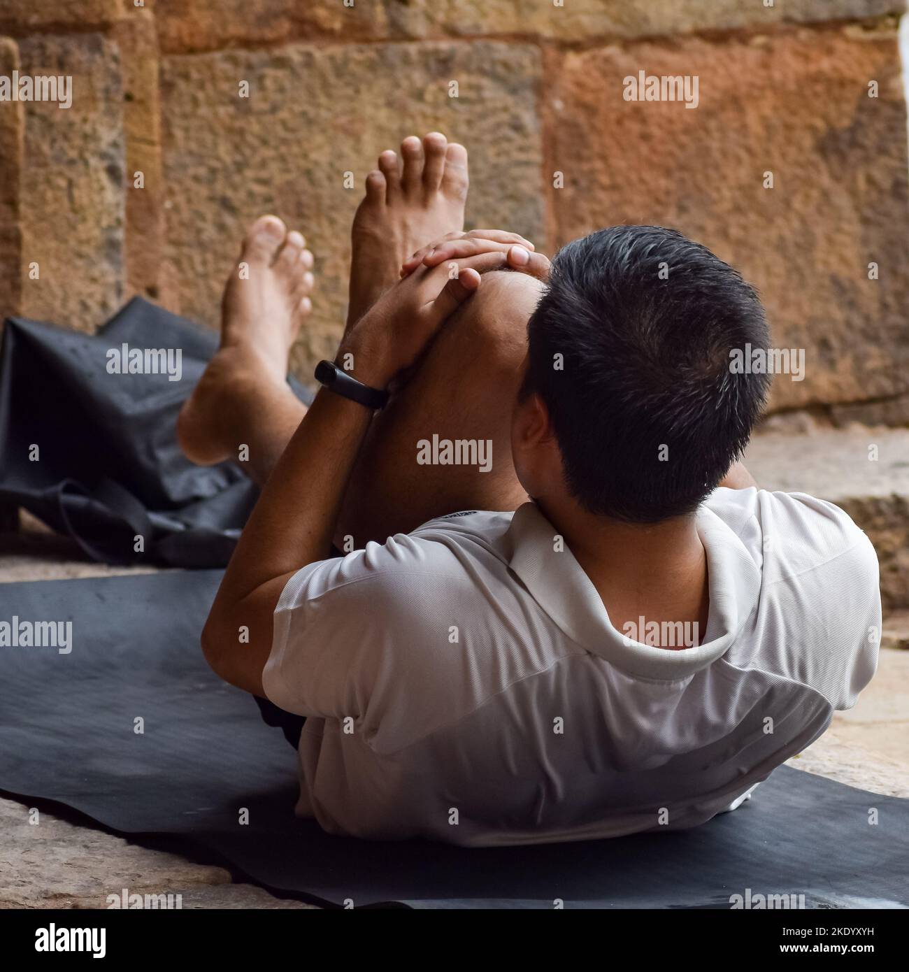 Delhi, India, June 18 2022 - Inspired Indian young man doing yoga ...
