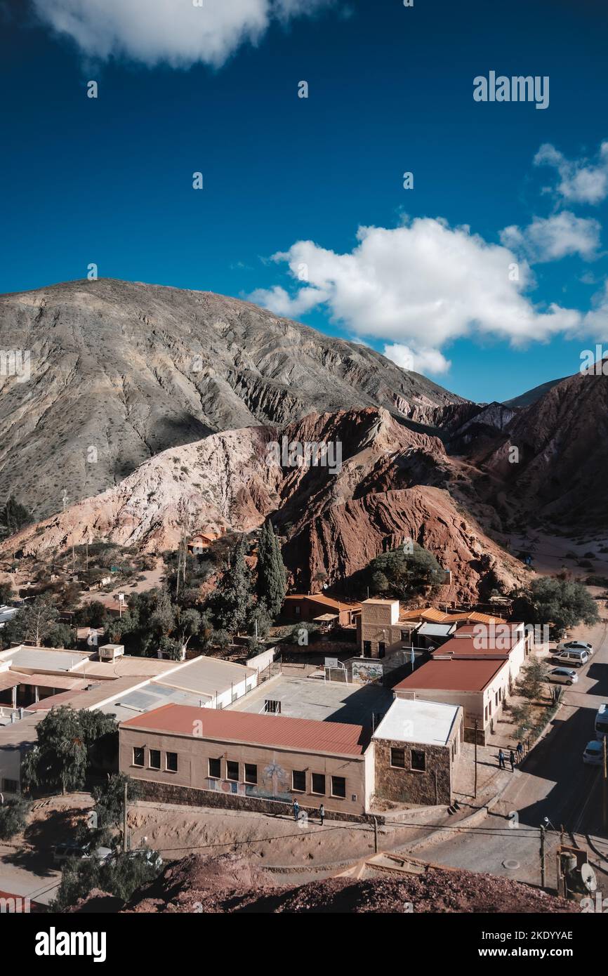 A vertical shot of Purmamarca town in Jujuy Province under the Hill of ...