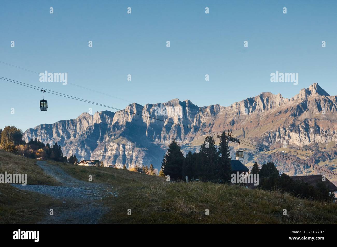 A beautiful shot of the mountains and nearby cable car in Churfirsten ...