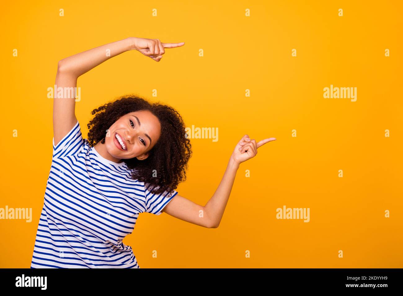 Photo of pretty cheerful person toothy smile direct fingers empty space ...