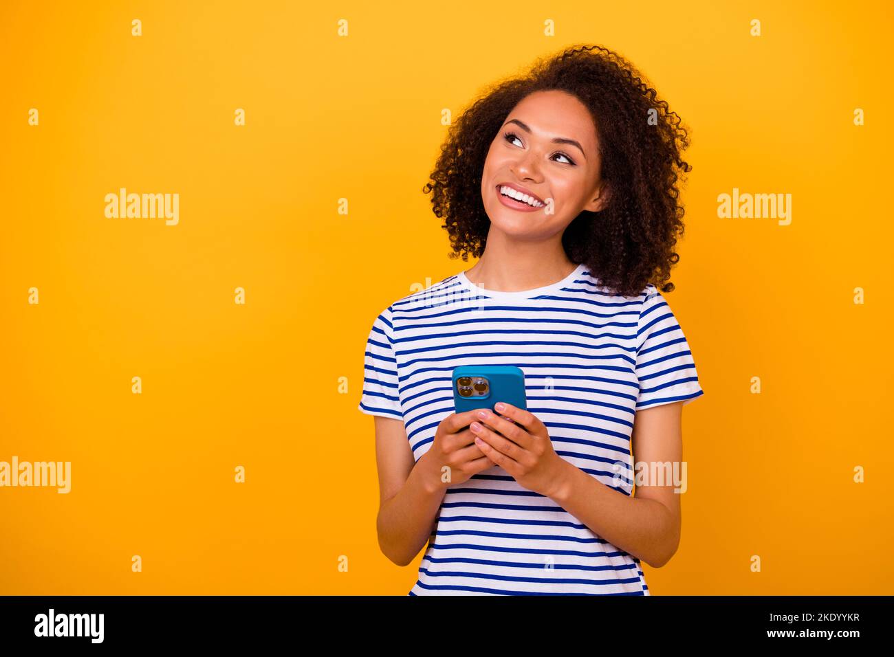 Photo of funny dreamy lady wear white t-shirt chatting modern device ...