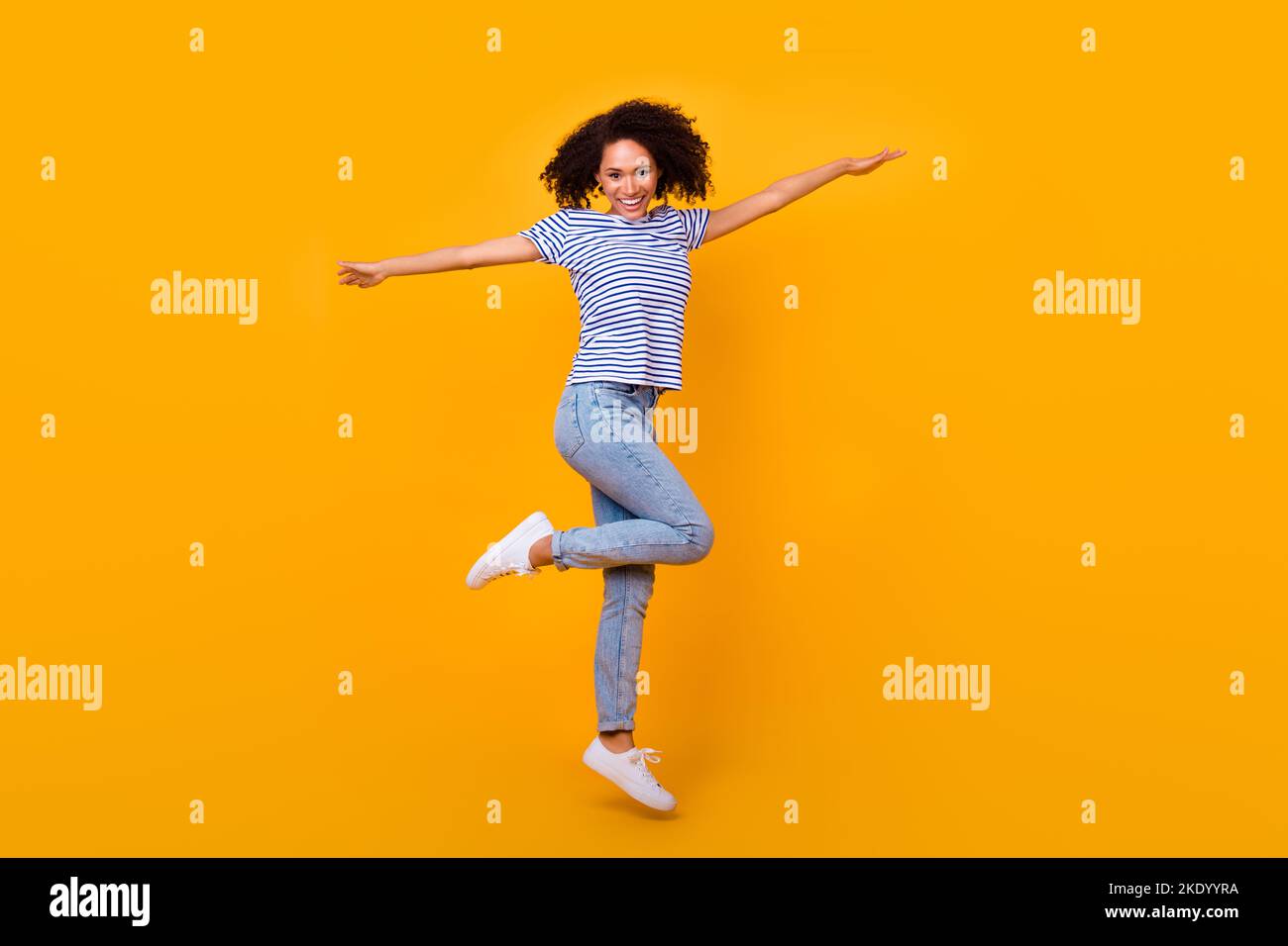 Full body photo of energetic cheerful girl jump have good mood rejoice ...