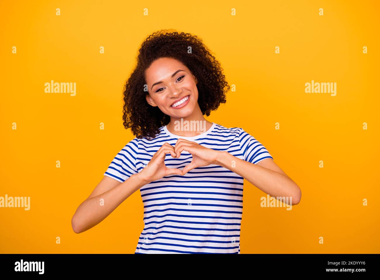 Photo of lovely cute lady hands fingers showing heart gesture isolated ...