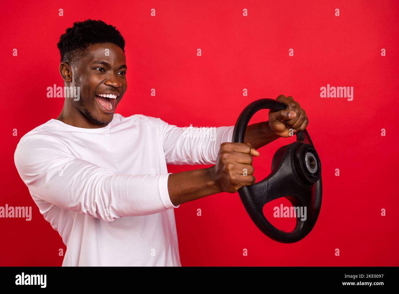 Profile photo of crazy positive person hold wheel look empty space ...