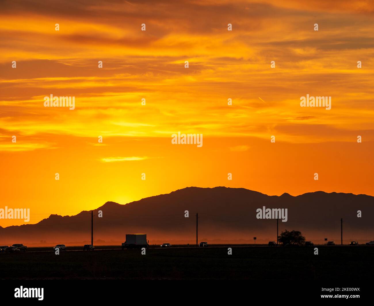 A stunning Arizona sunset on a cool, crisp and clear fall evening glows ...