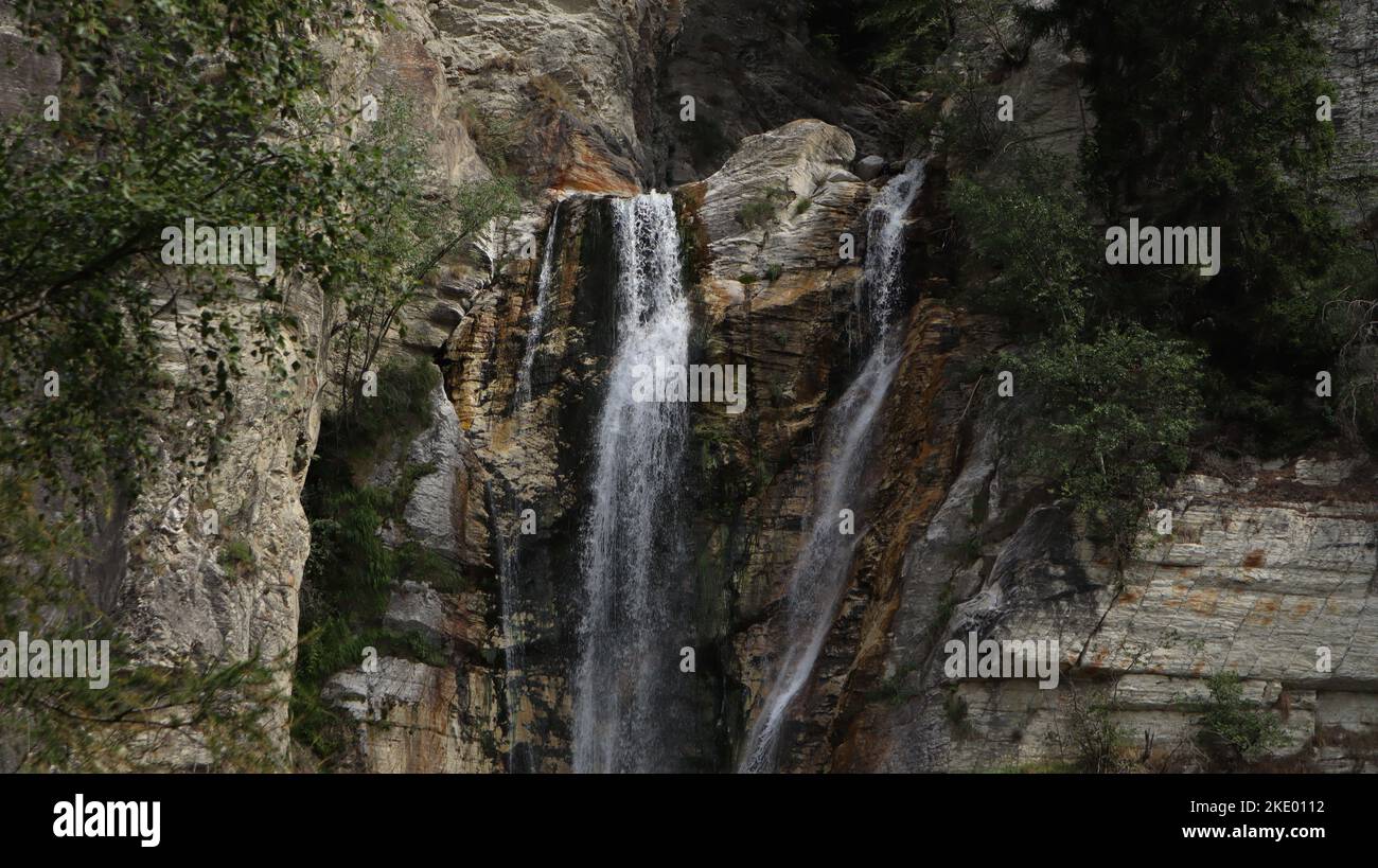 A rocky waterfall in the forest Stock Photo - Alamy