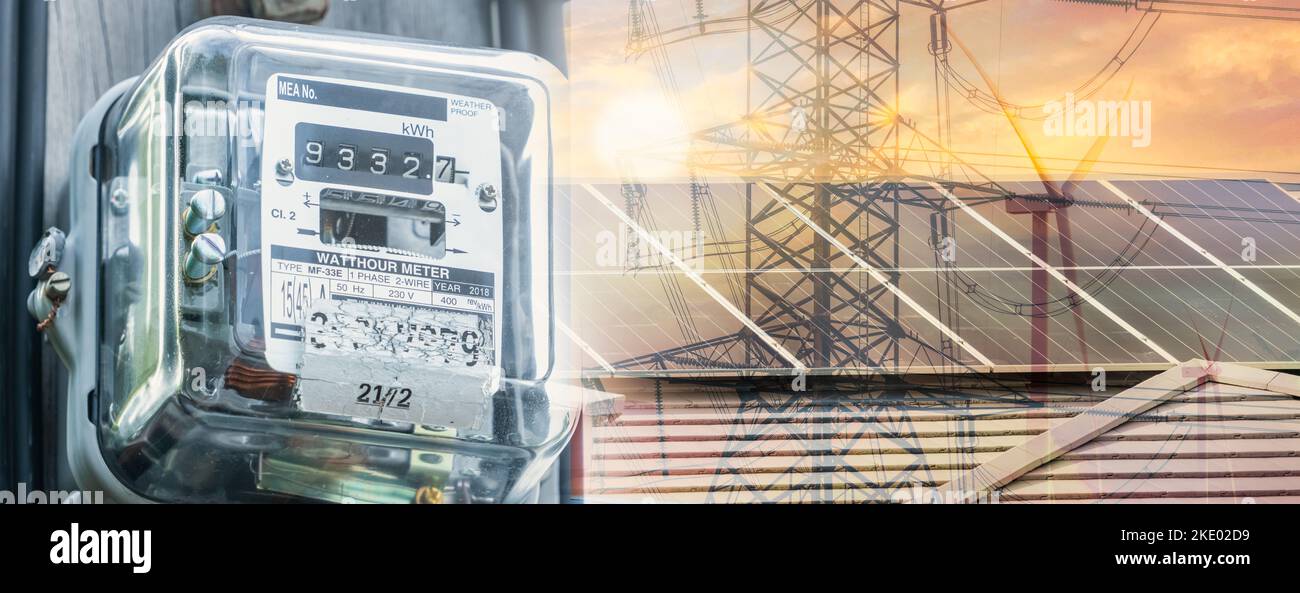 Watt hour meter on rooftop solar, wind turbine, and electric pylon ...