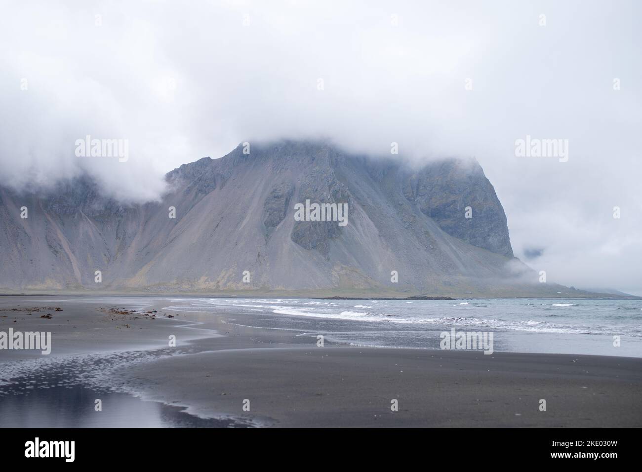 A landscape view of Stockness Beach. Iceland with mountains Stock Photo ...