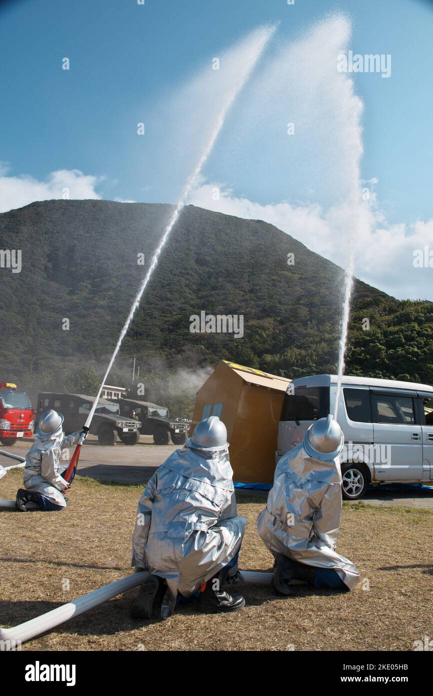 Kozushima, Japan. 09th Nov, 2022. Fire fighting party Members of ...