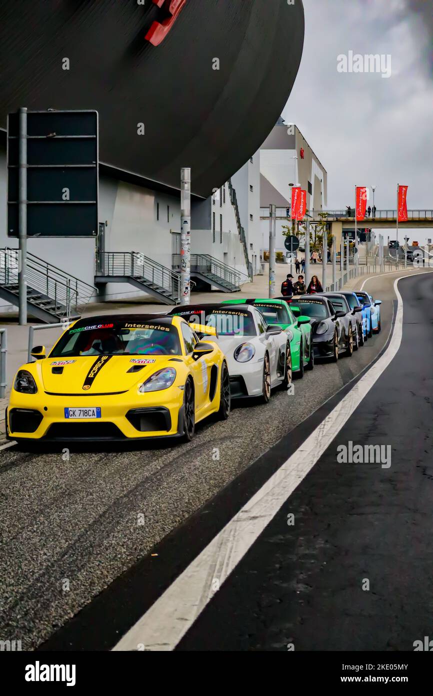 A vertical shot of Porsche cars lineup from the Porsche Club ...