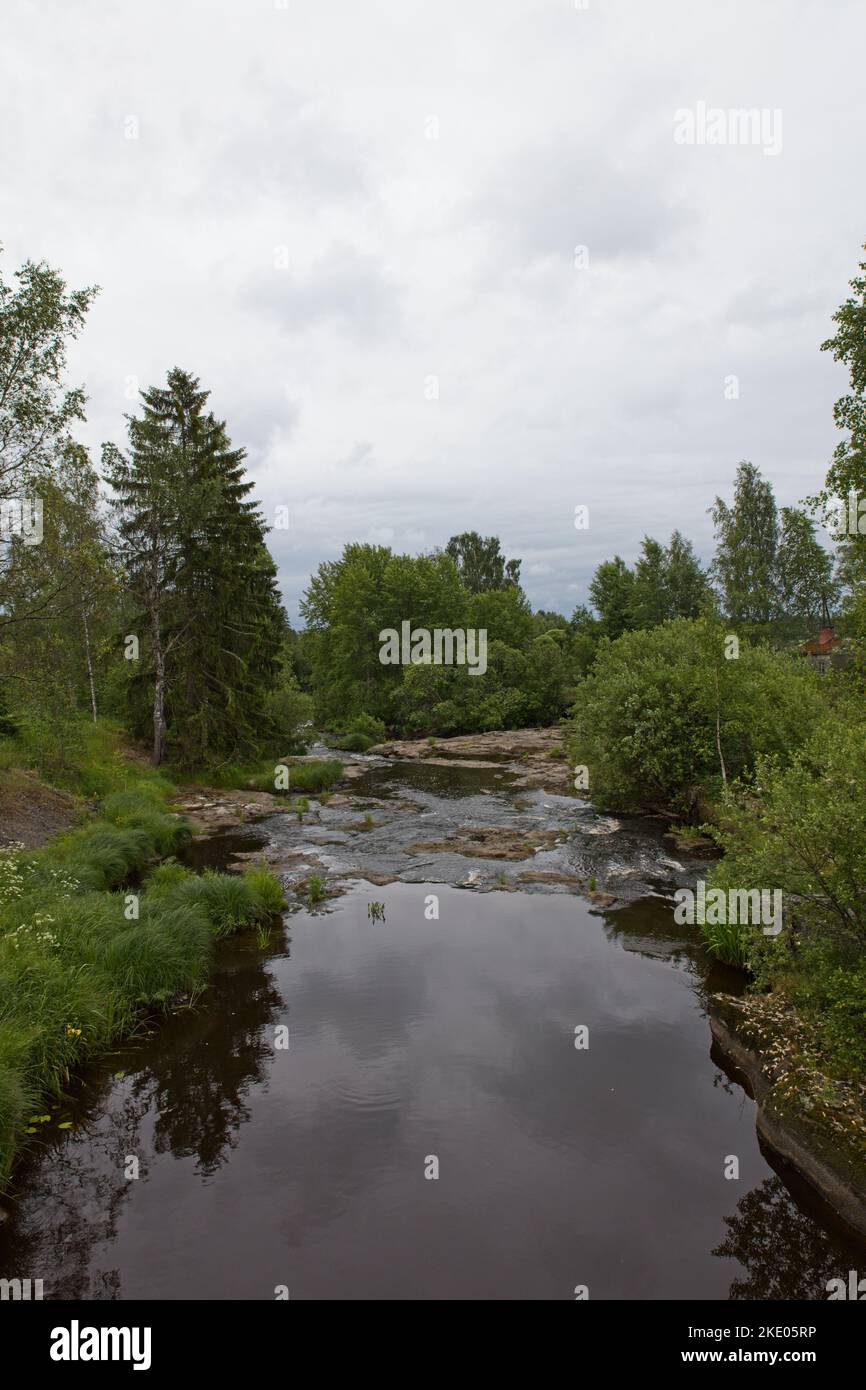 View of Hirvihaaranjoki river in cloudy weather in summer, Hirvihaara ...