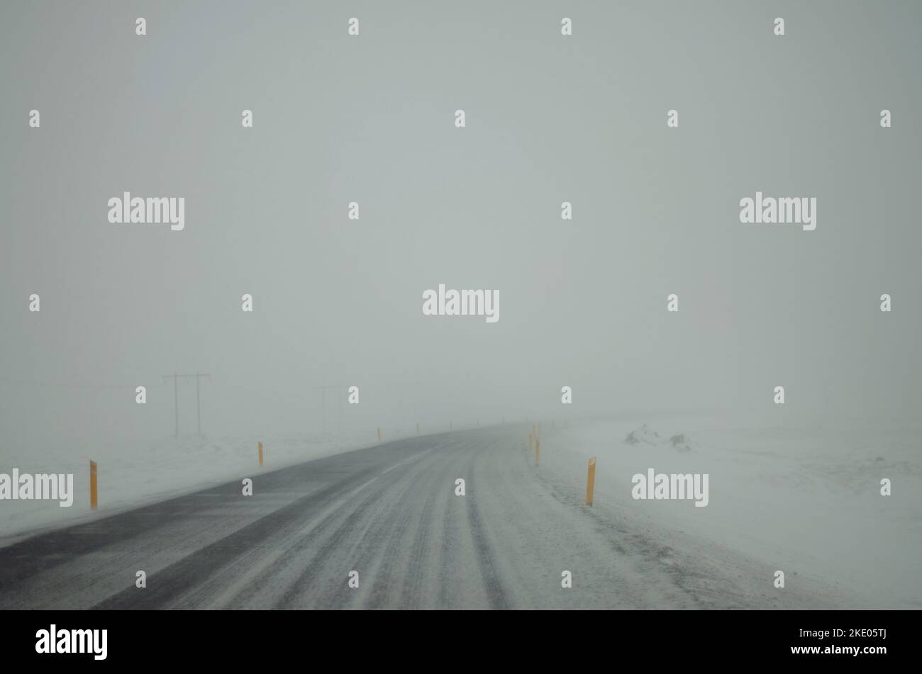 A road in Iceland during heavy snowfall Stock Photo - Alamy
