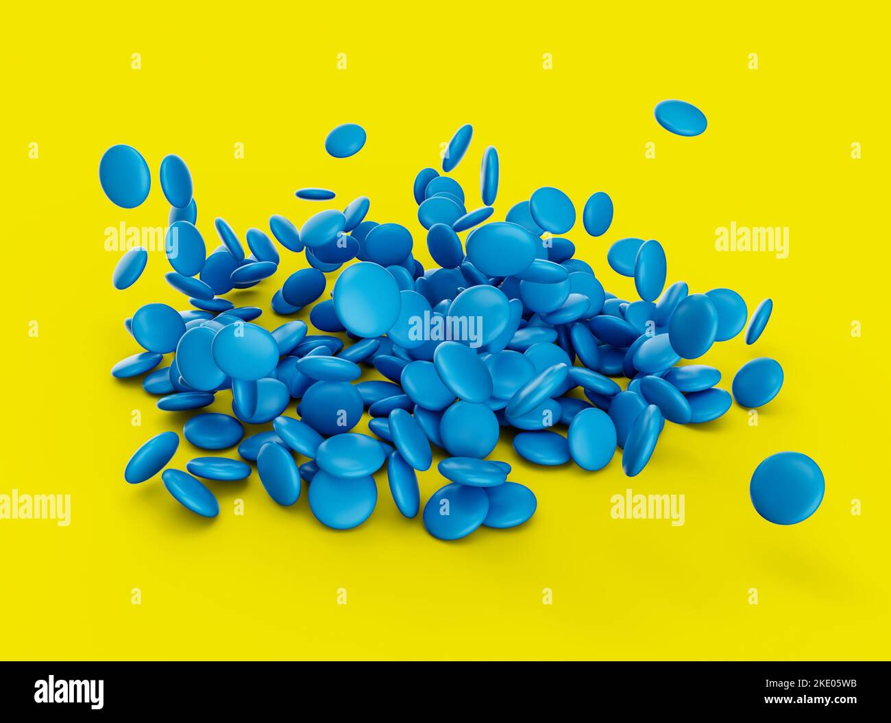 A 3d rendering of blue candy coated chocolate buttons falling on Yellow ...