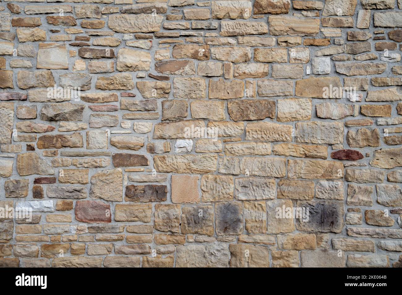 A background of beige brick wall Stock Photo - Alamy