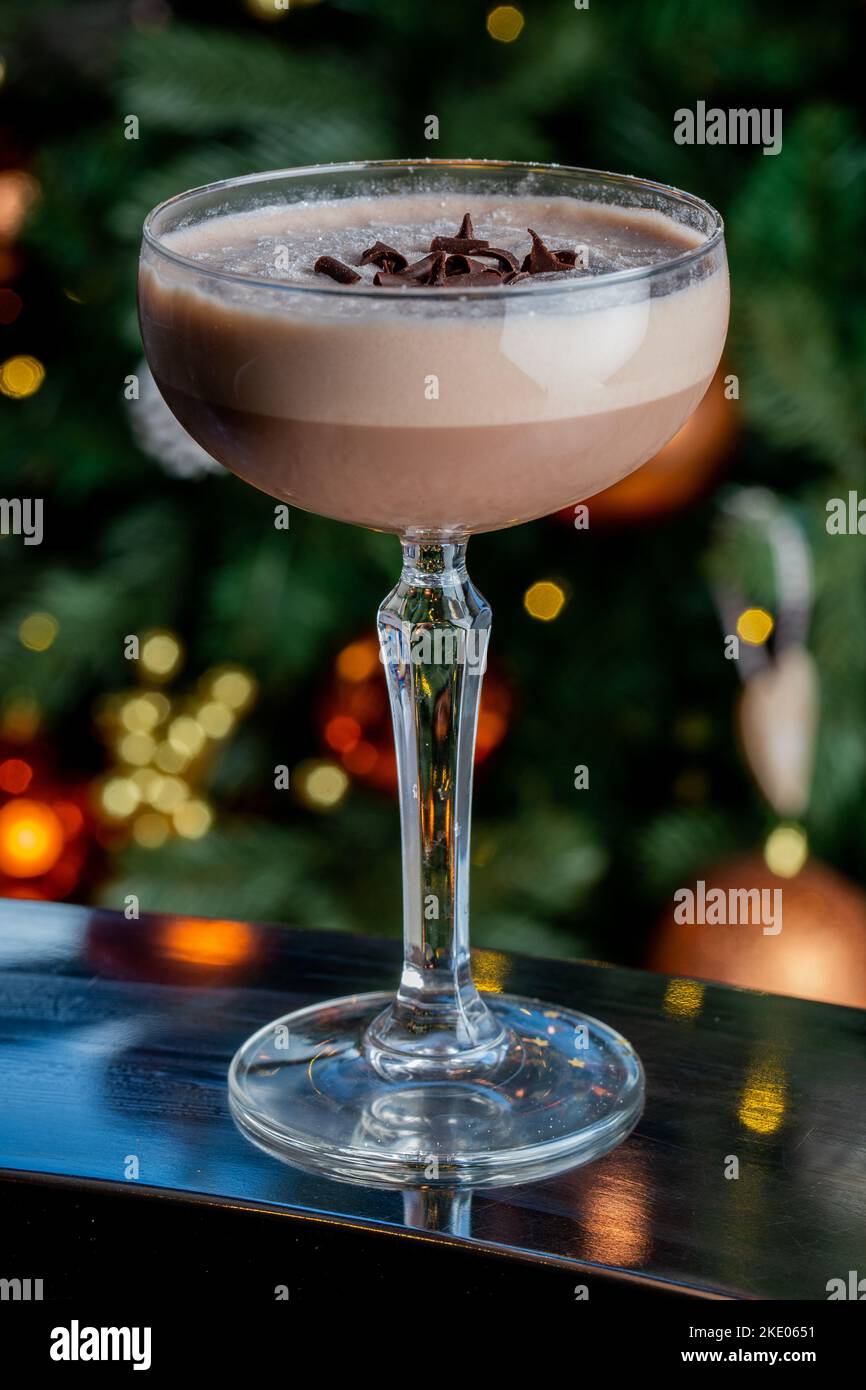 A vertical shot of nog a blend of coconut and almond milk, tea, and rum ...