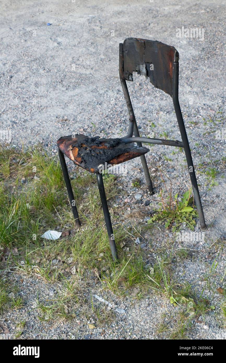 Old burned metal chair Stock Photo - Alamy