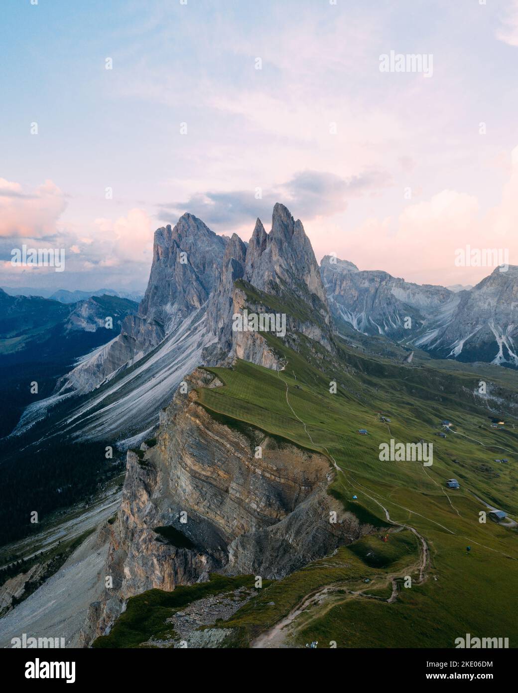 A vertical shot of the rocky Seceda mountain in Italy with a scenic ...