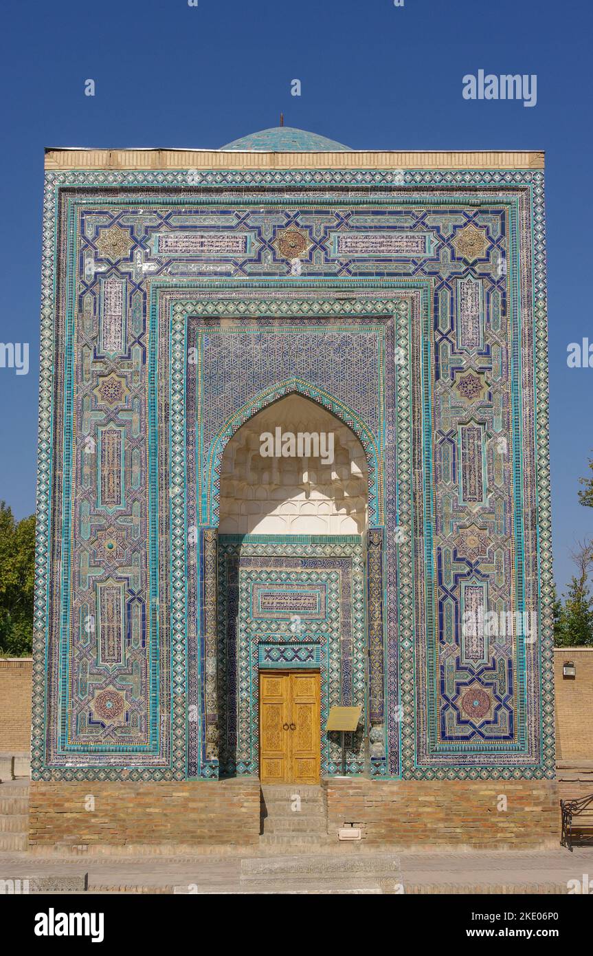 Front view of beautiful facade of medieval mausoleum with blue tile ...