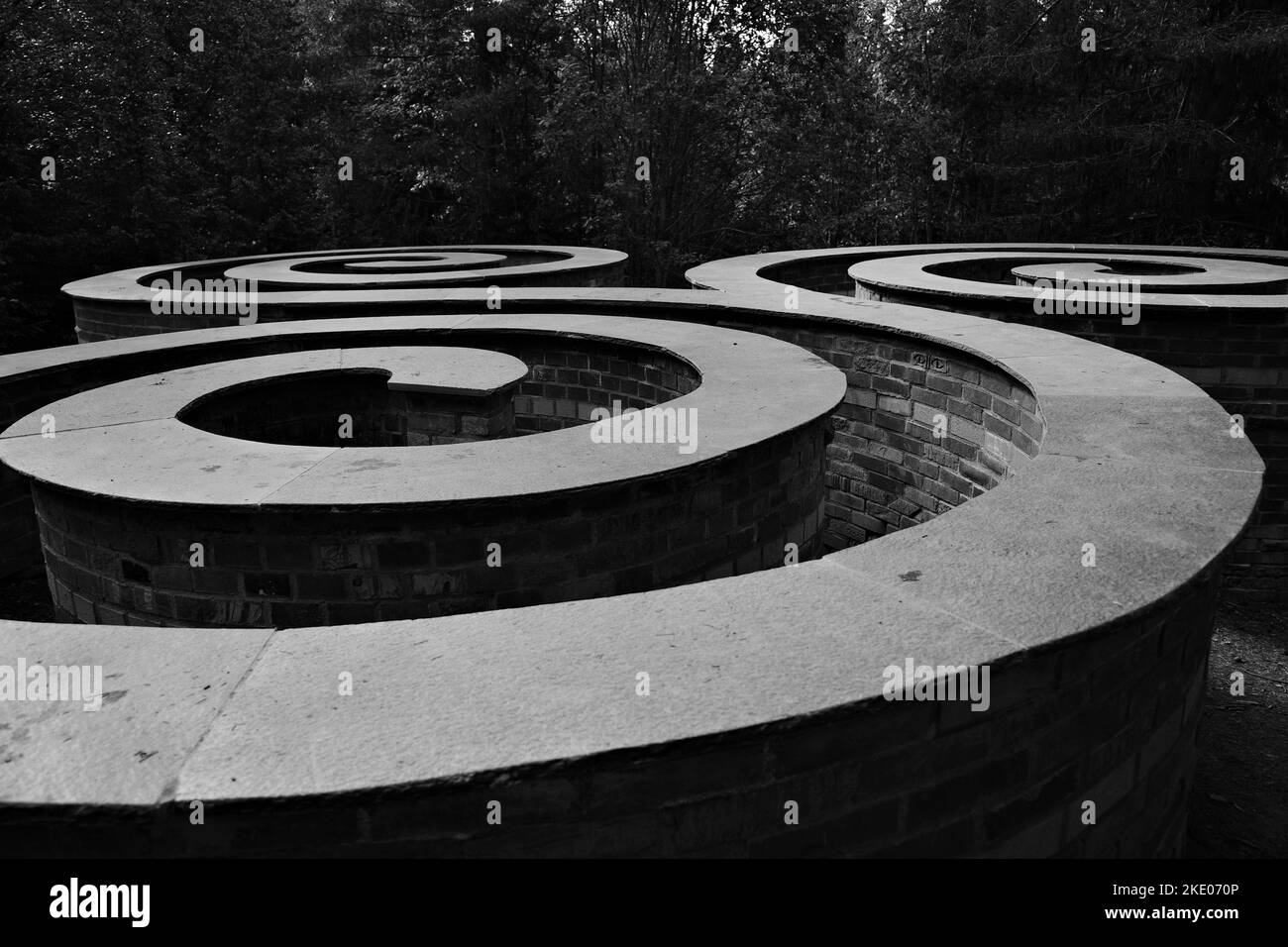 A monochrome shot of the round labyrinth in the landscape Stock Photo ...