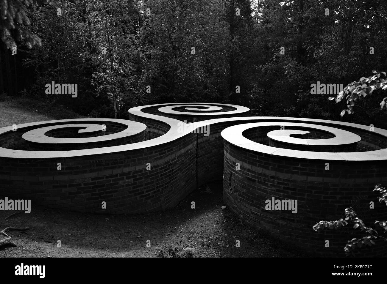 A monochrome shot of the round labyrinth in the landscape Stock Photo ...