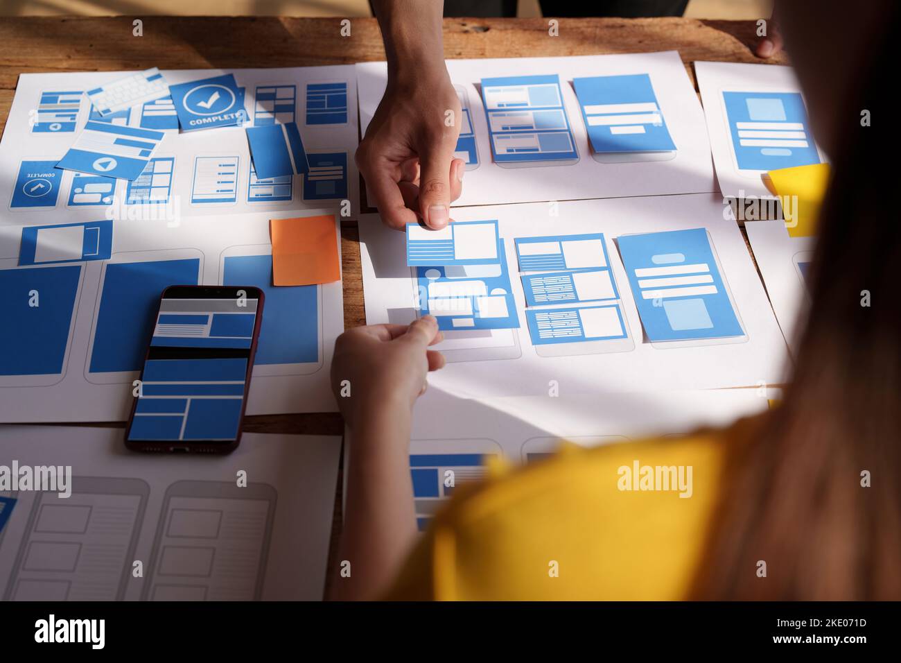 Group of ux developer and ui designer brainstorming about app interface ...