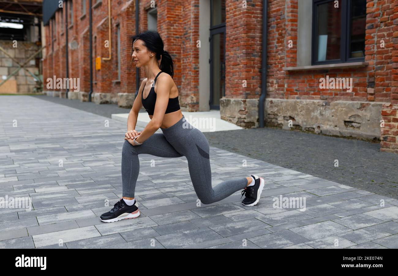 Woman 40s exercise lunges hi-res stock photography and images - Alamy
