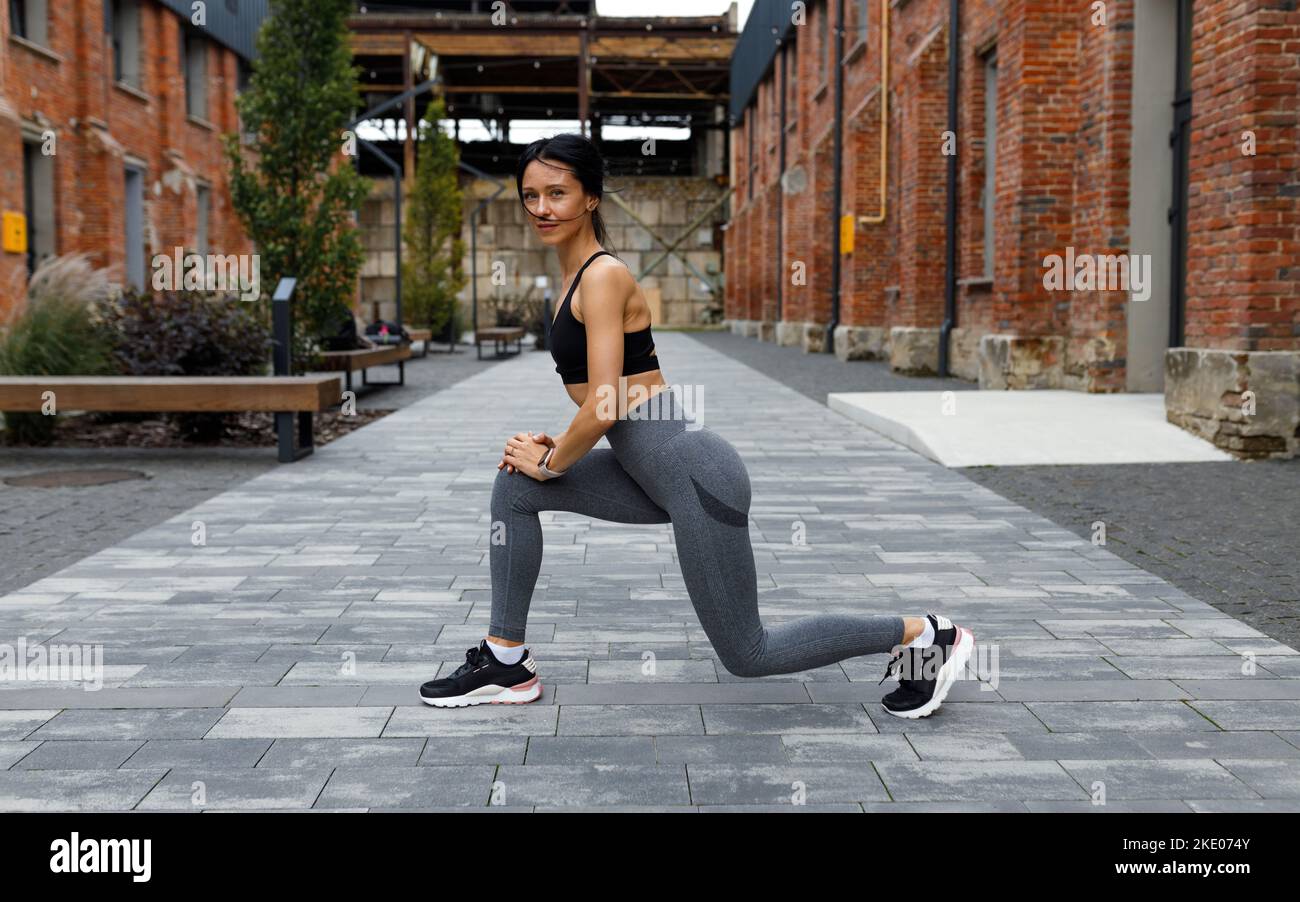 Woman 40s exercise lunges hi-res stock photography and images - Alamy