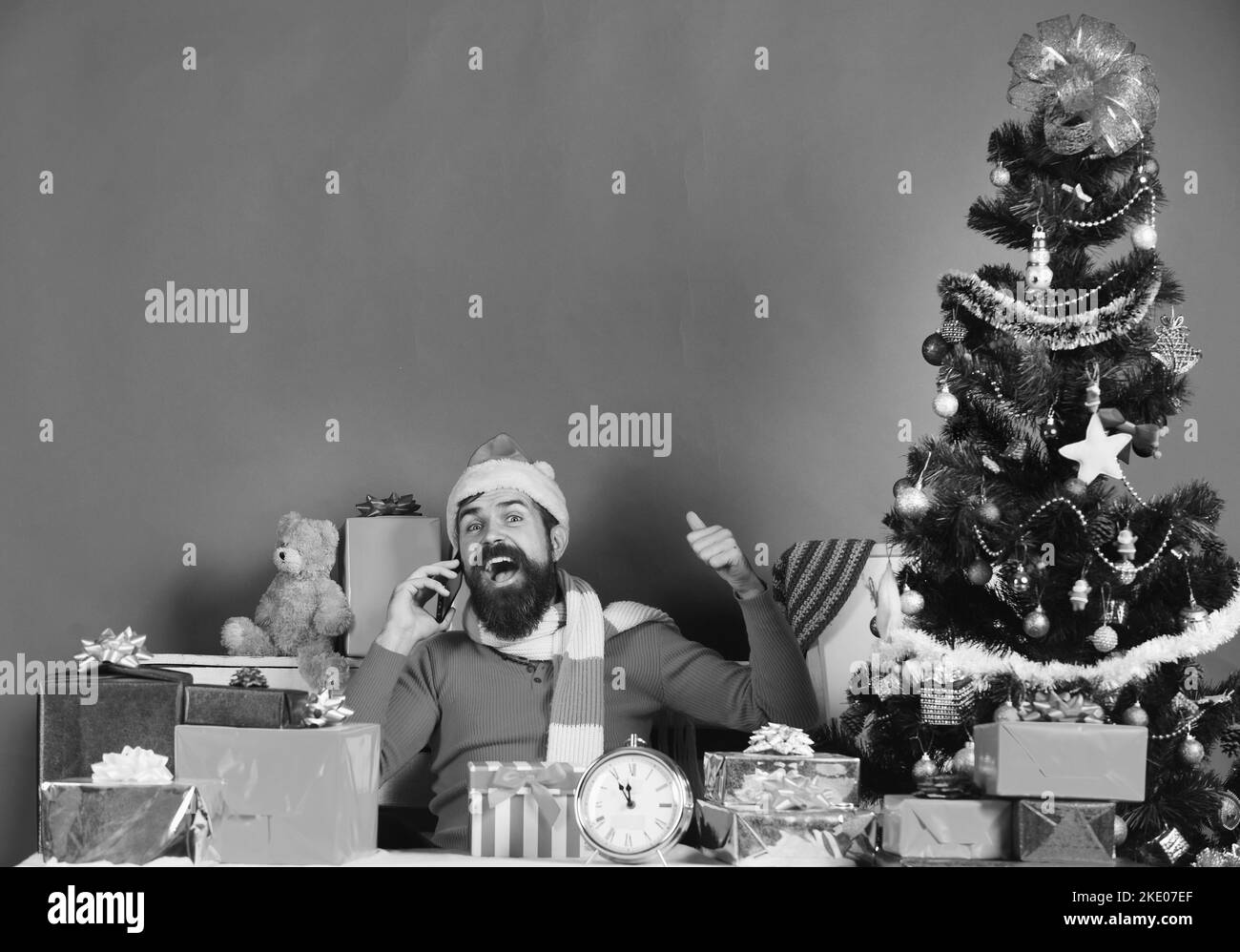 Man with beard and excited face sends greetings on holiday Stock Photo ...