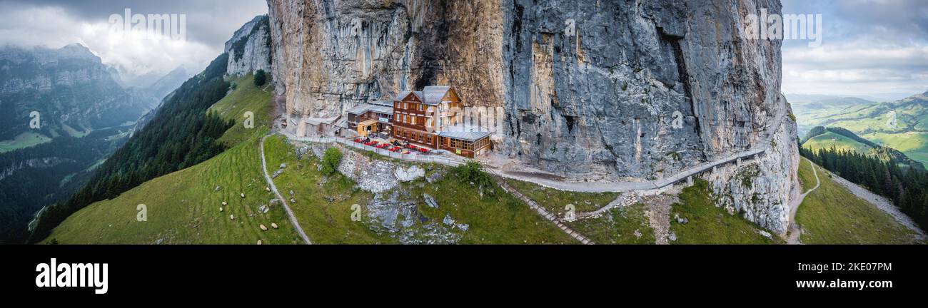 A beautiful panoramic view of a mountain hut, Berggasthaus Aescher ...