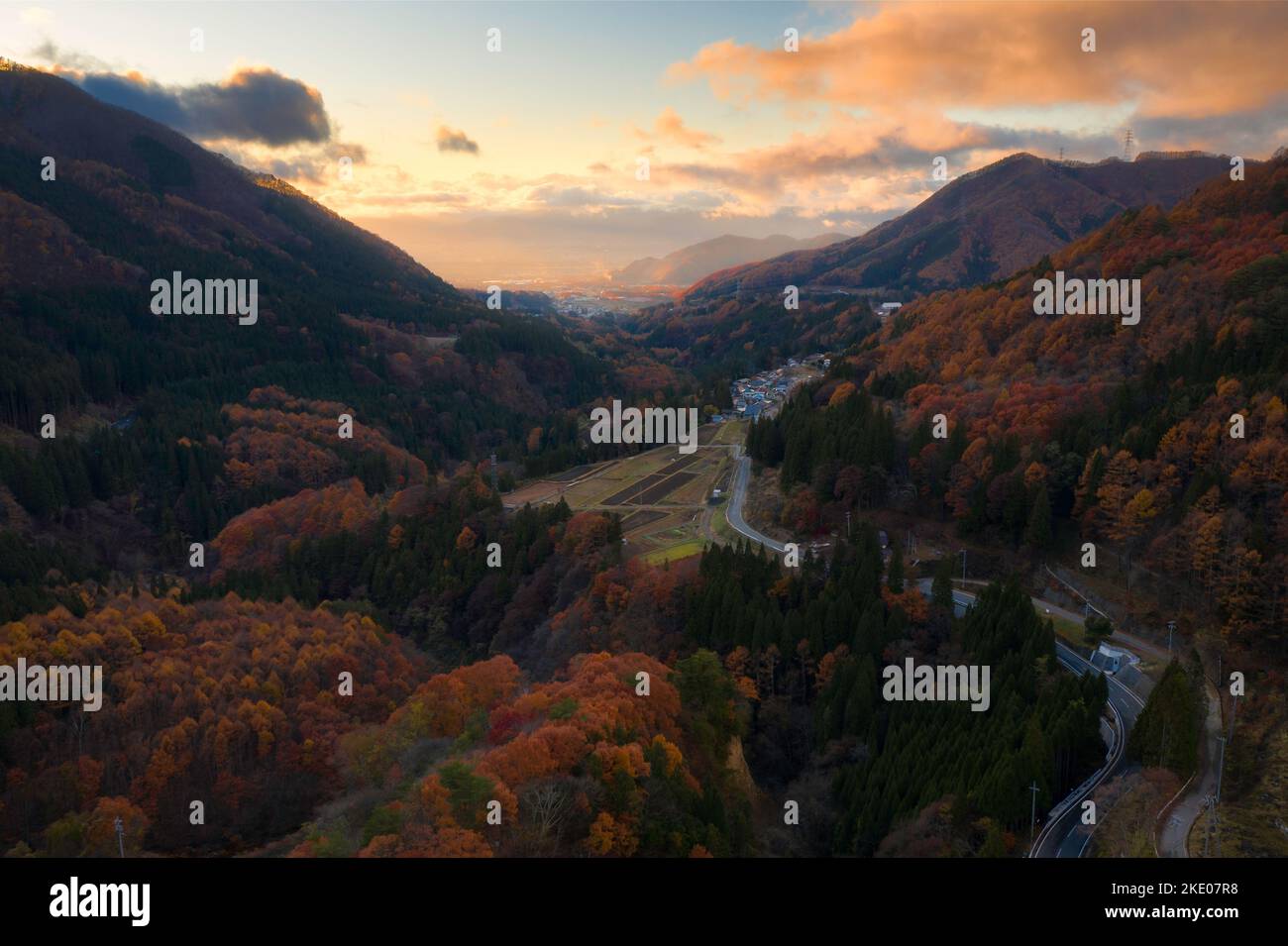A scenic bird's eye view of beautiful mountains with colorful trees in ...