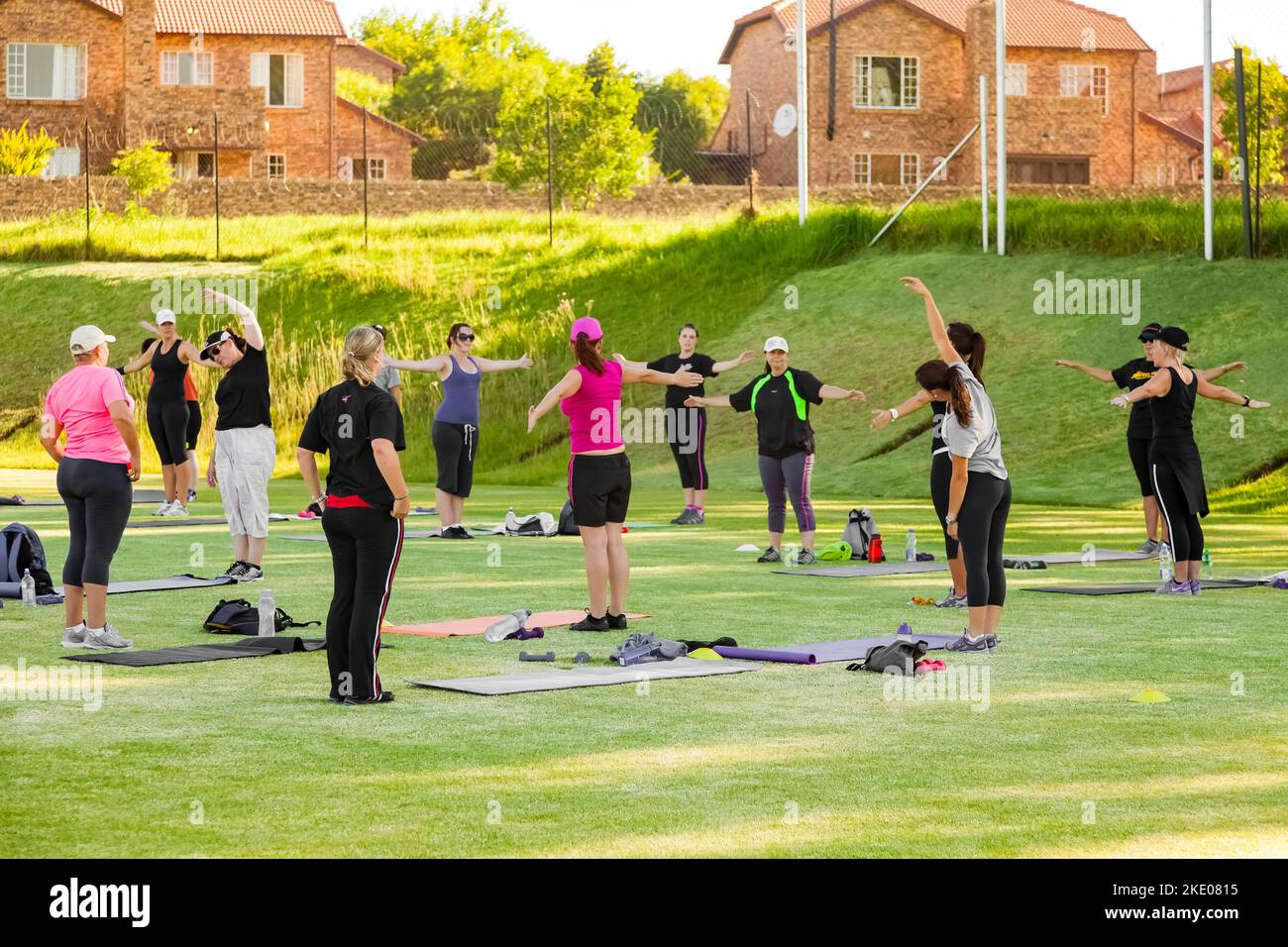 The woman's outdoor fitness and strength bootcamp in the park covered ...