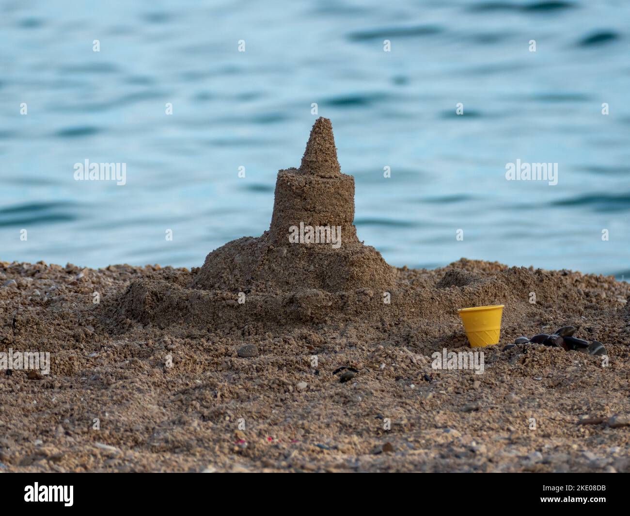 A closeup of sandy tower in sea beach Stock Photo - Alamy