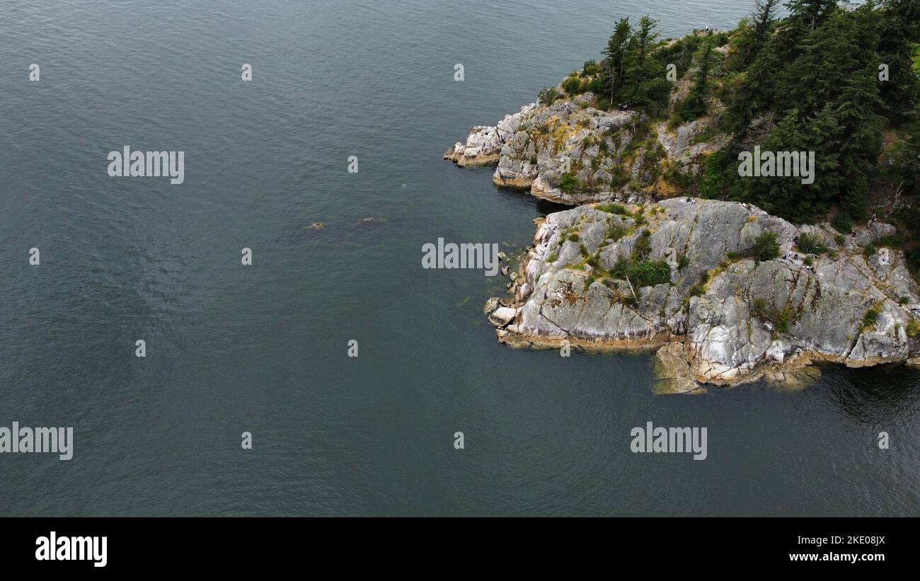 A bird's eye view of an island in a lake in British Columbia, Canada on ...