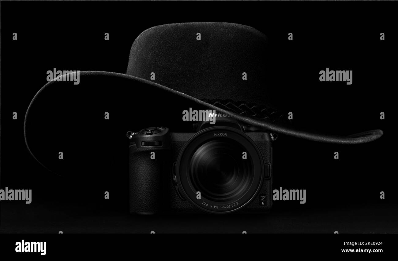 A closeup of Nikon Camera wearing a cowboy hat Stock Photo - Alamy