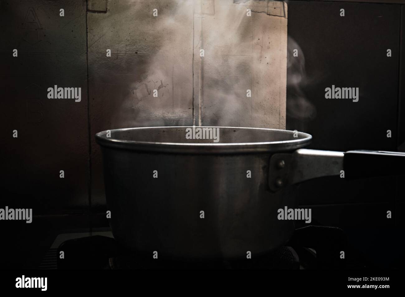 The smoke emitted from the pot egg cauldron on the stove Stock Photo ...