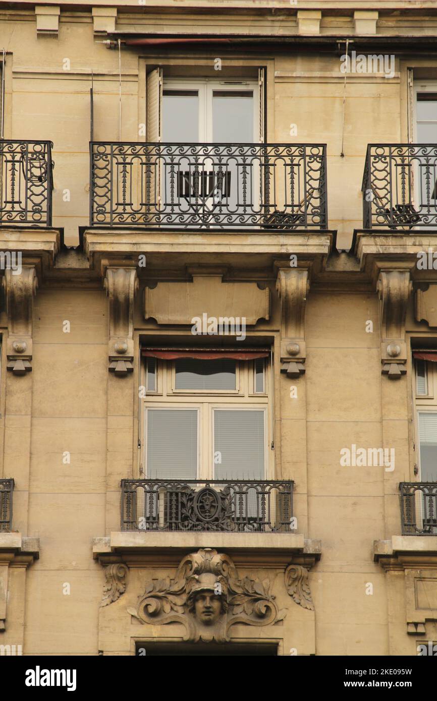 A vertical shot of a building facade with a beautiful ornamented ...